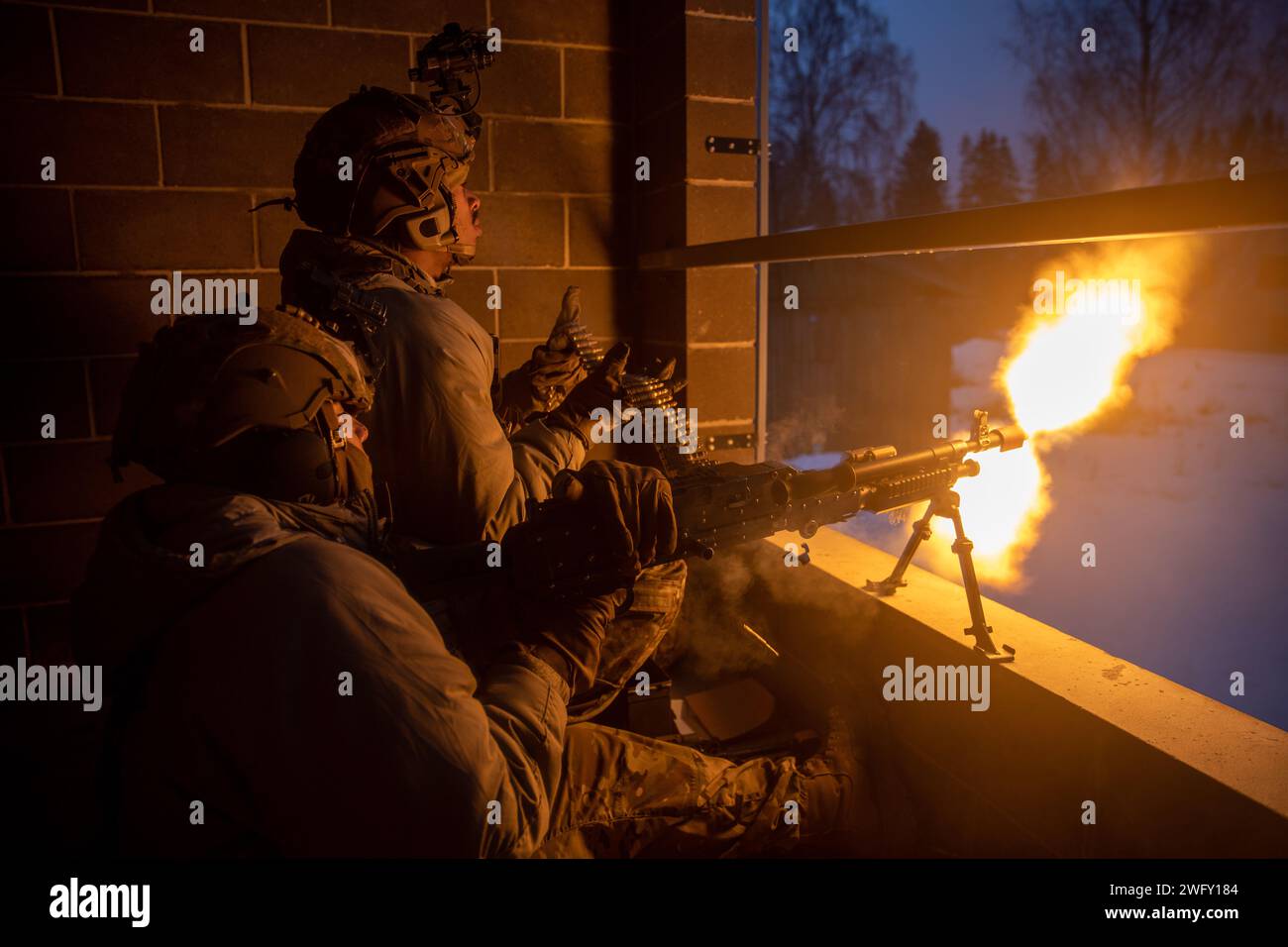 U.S. Army Soldier Spc. Victor Santana, a machine gunner, and Spc. Juan ...