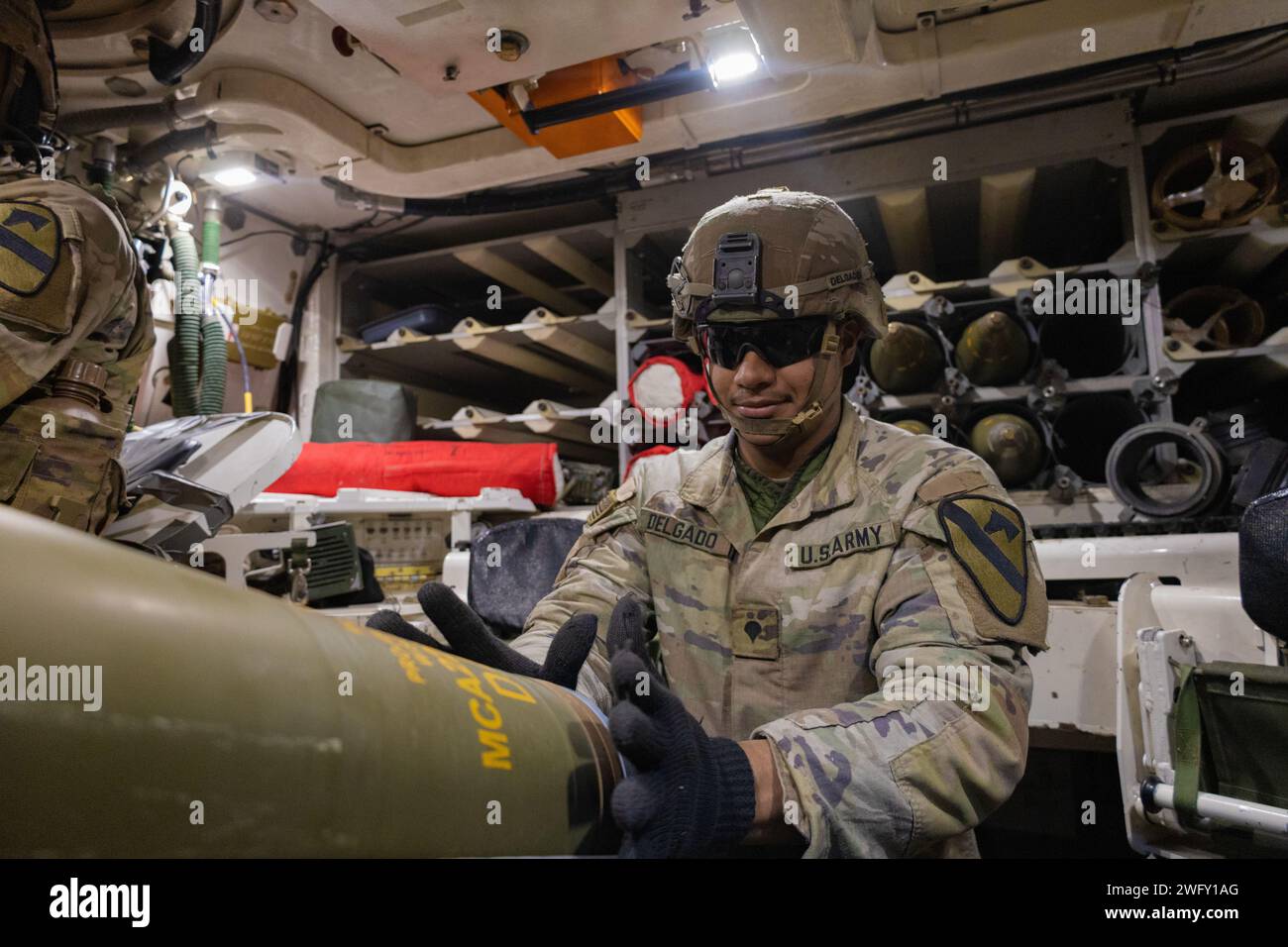 Spc. Brandon Delgado, a U.S. Army Trooper assigned to Apex Battery, 2nd ...