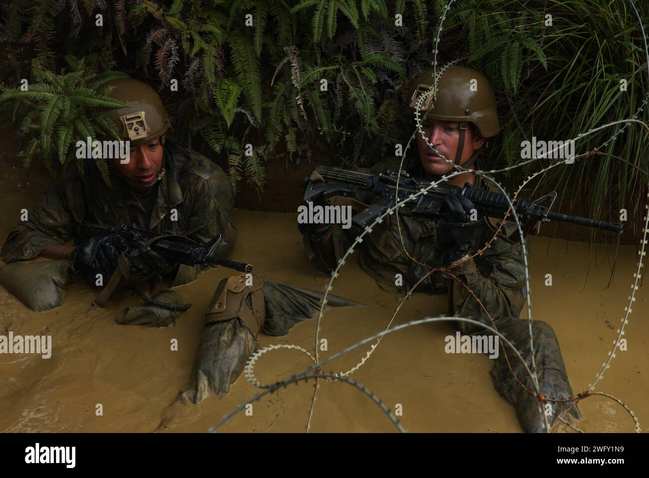 U.S. Marine Corps Lance Cpl. Cristian Cornelio, left, a light armored ...