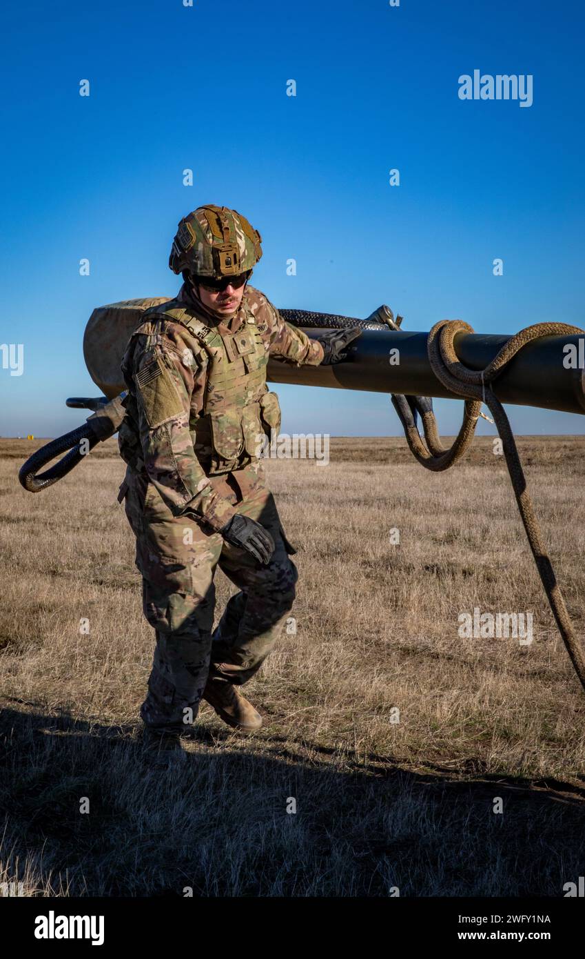 Spc. Chris Stuts, an artillery Soldier from Bravo Battery, 3rd Battalion, 320th Field Artillery ...