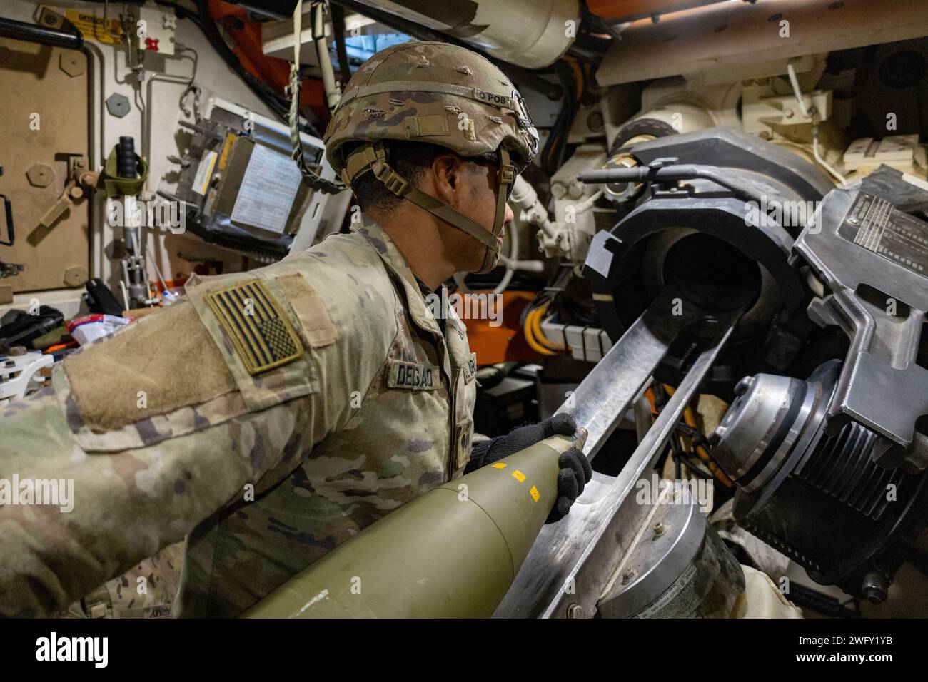 Spc. Brandon Delgado, a U.S. Army Trooper assigned to Apex Battery, 2nd ...
