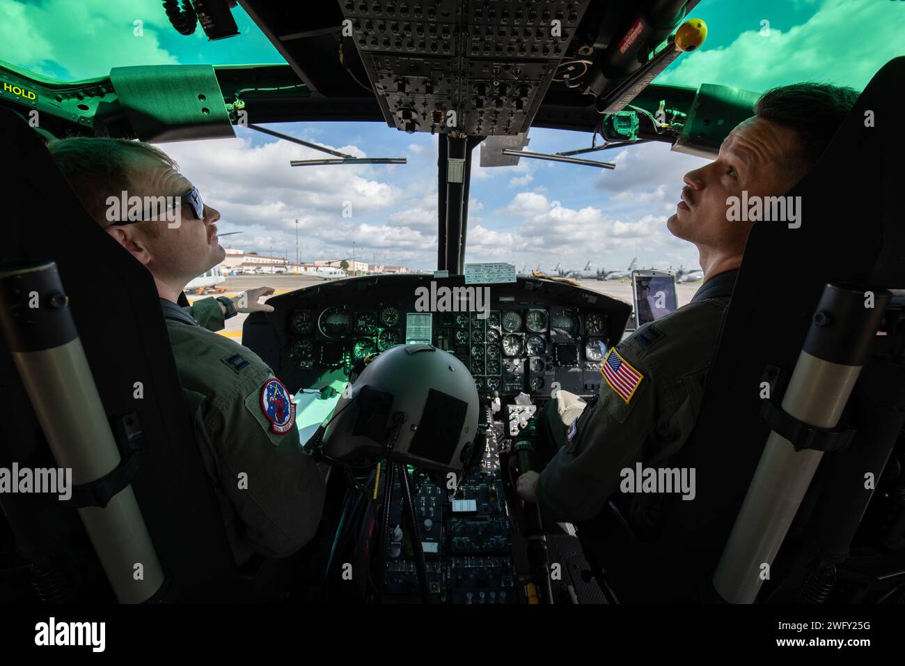 U.S. Air Force Capt. Colton McConnell, left, and Capt. Matthew Helm ...