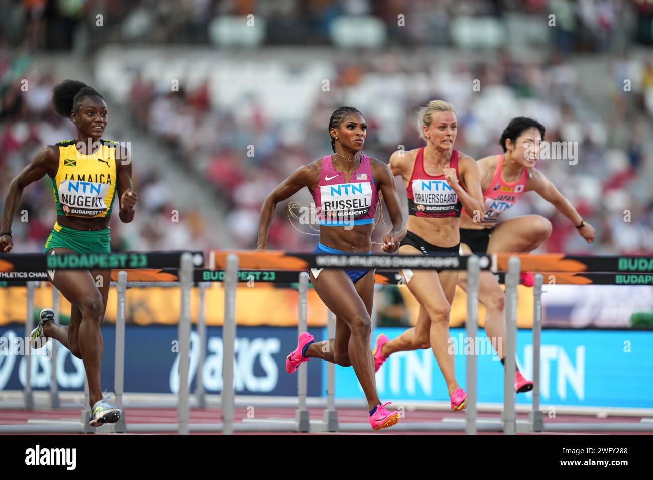 Masai RUSSELL participating in the 100 meters hurdles at the World ...