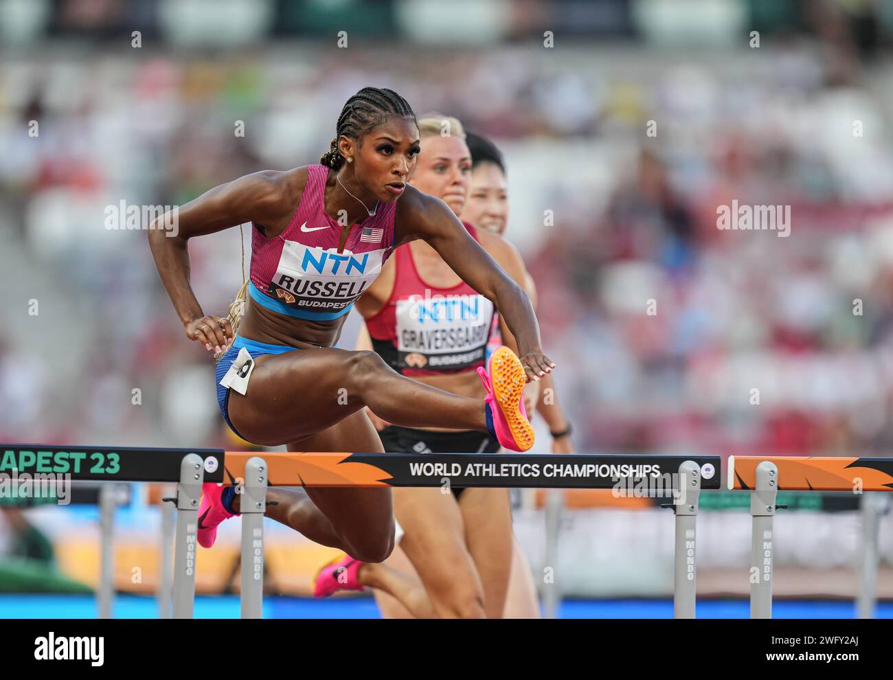 Masai RUSSELL participating in the 100 meters hurdles at the World ...
