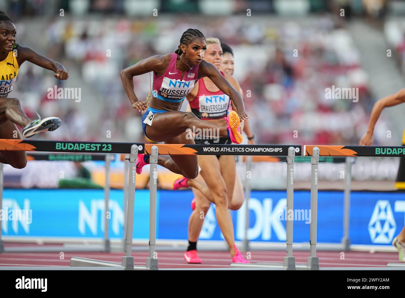 Masai RUSSELL participating in the 100 meters hurdles at the World ...