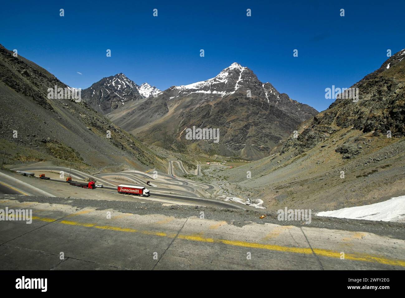 Los Caracoles desert highway, with many curves, in the Andes mountains ...