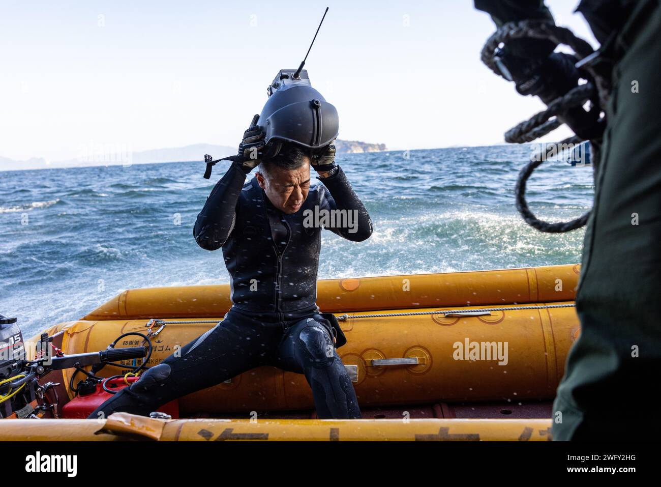 A Japan Maritime Self-Defense Force, rescue swimmer with Air Rescue ...