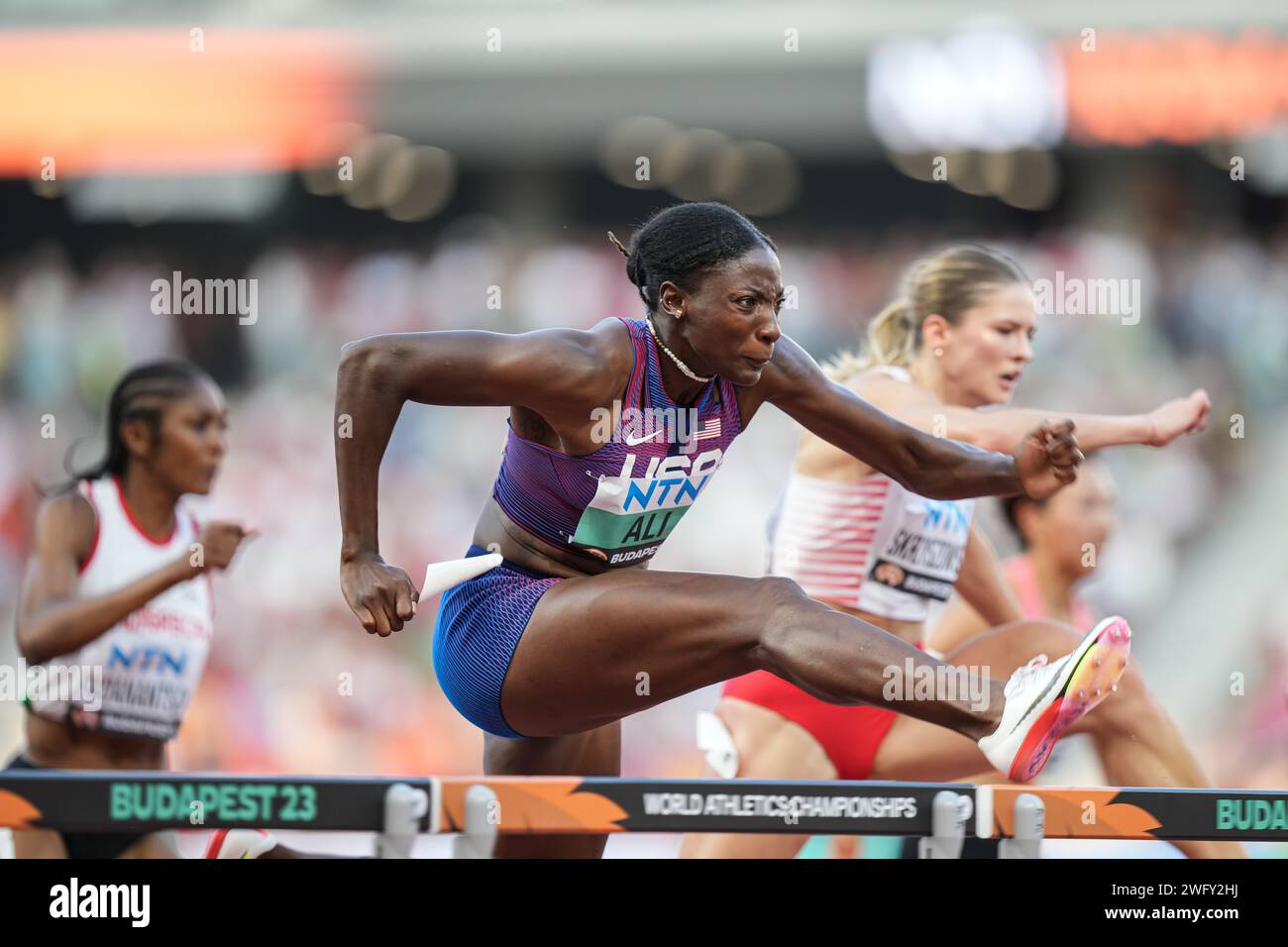 Nia ALI participating in the 100 meters hurdles at the World Athletics ...