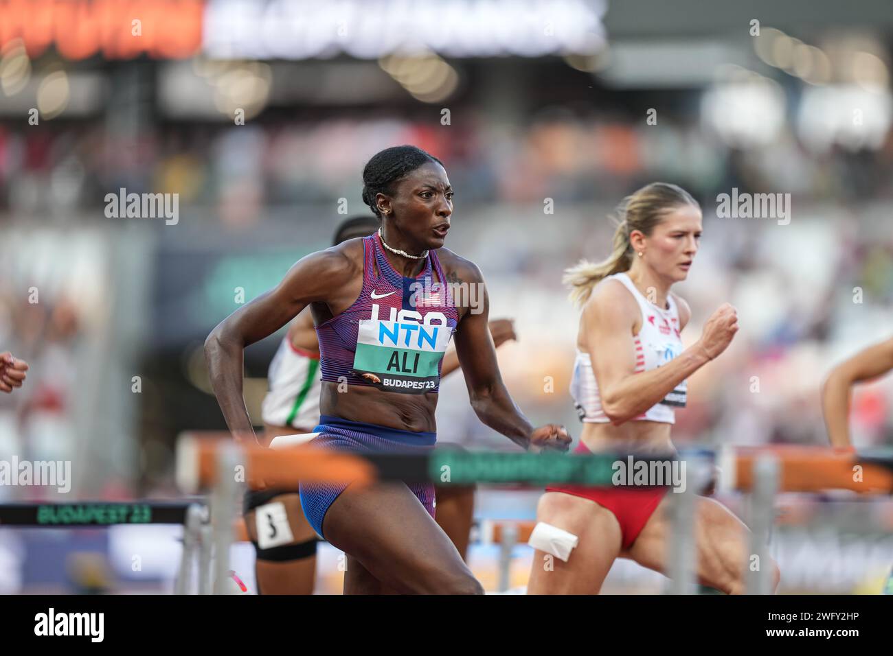 Nia ALI participating in the 100 meters hurdles at the World Athletics ...