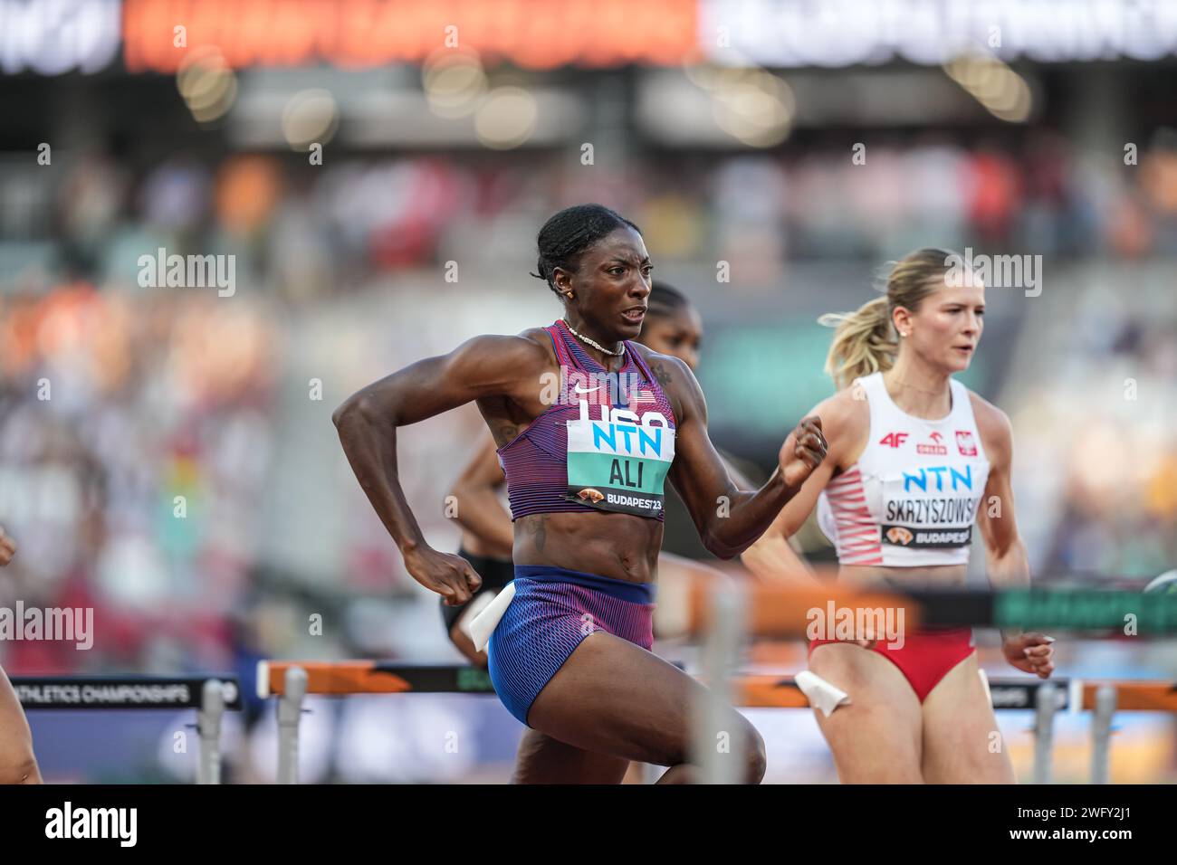 Nia ALI participating in the 100 meters hurdles at the World Athletics ...