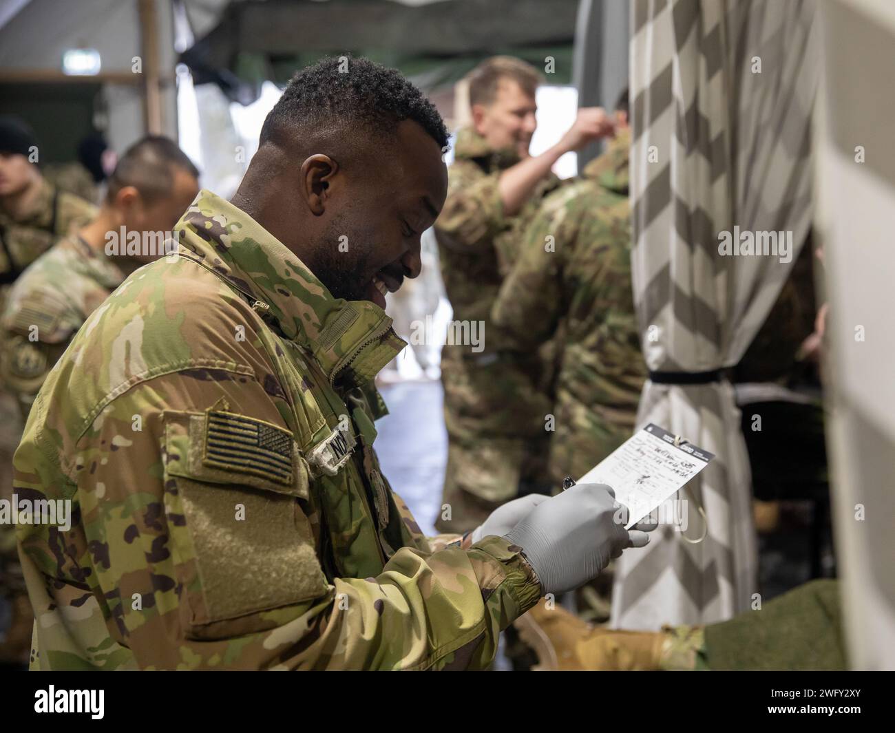 U.S. Army Sgt. Kelechi Nduka, a combat medic attached to Headquarters ...