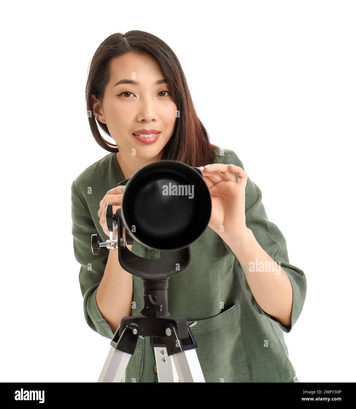 Young Asian woman with telescope on white background Stock Photo - Alamy