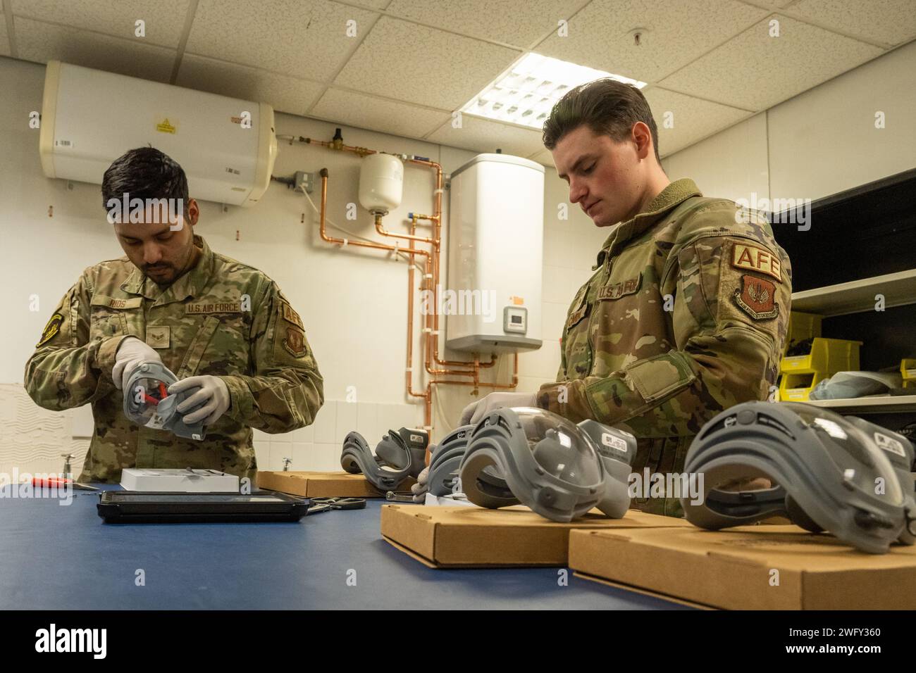 U.S. Air Force Airman 1st Class George Rios, left, and Senior Airman ...