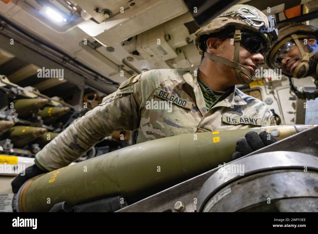 Spc. Brandon Delgado, a U.S. Army Trooper assigned to Apex Battery, 2nd ...