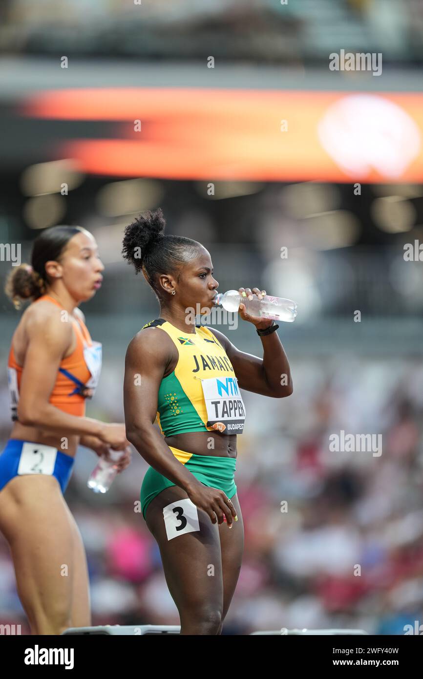 Megan TAPPER participating in the 100 meters hurdles at the World ...