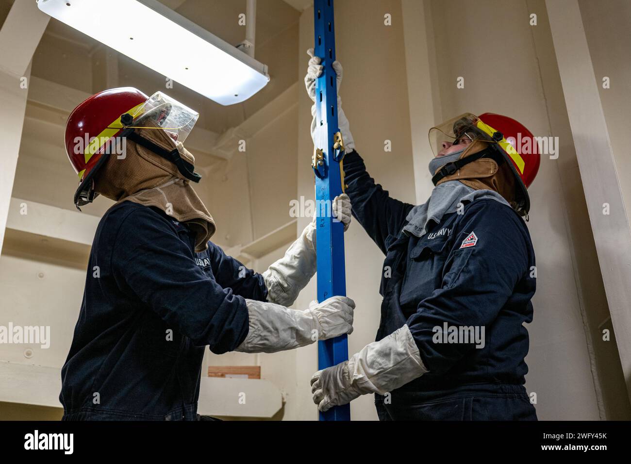 Hull Maintenance Technician 3rd Class Rylin Lewis (left), a native of ...