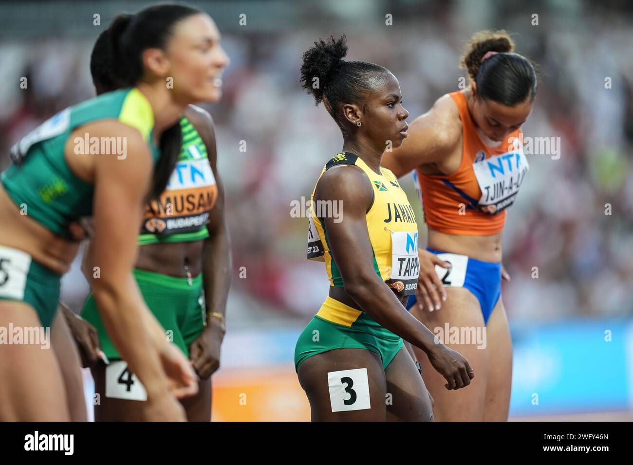 Megan TAPPER participating in the 100 meters hurdles at the World ...