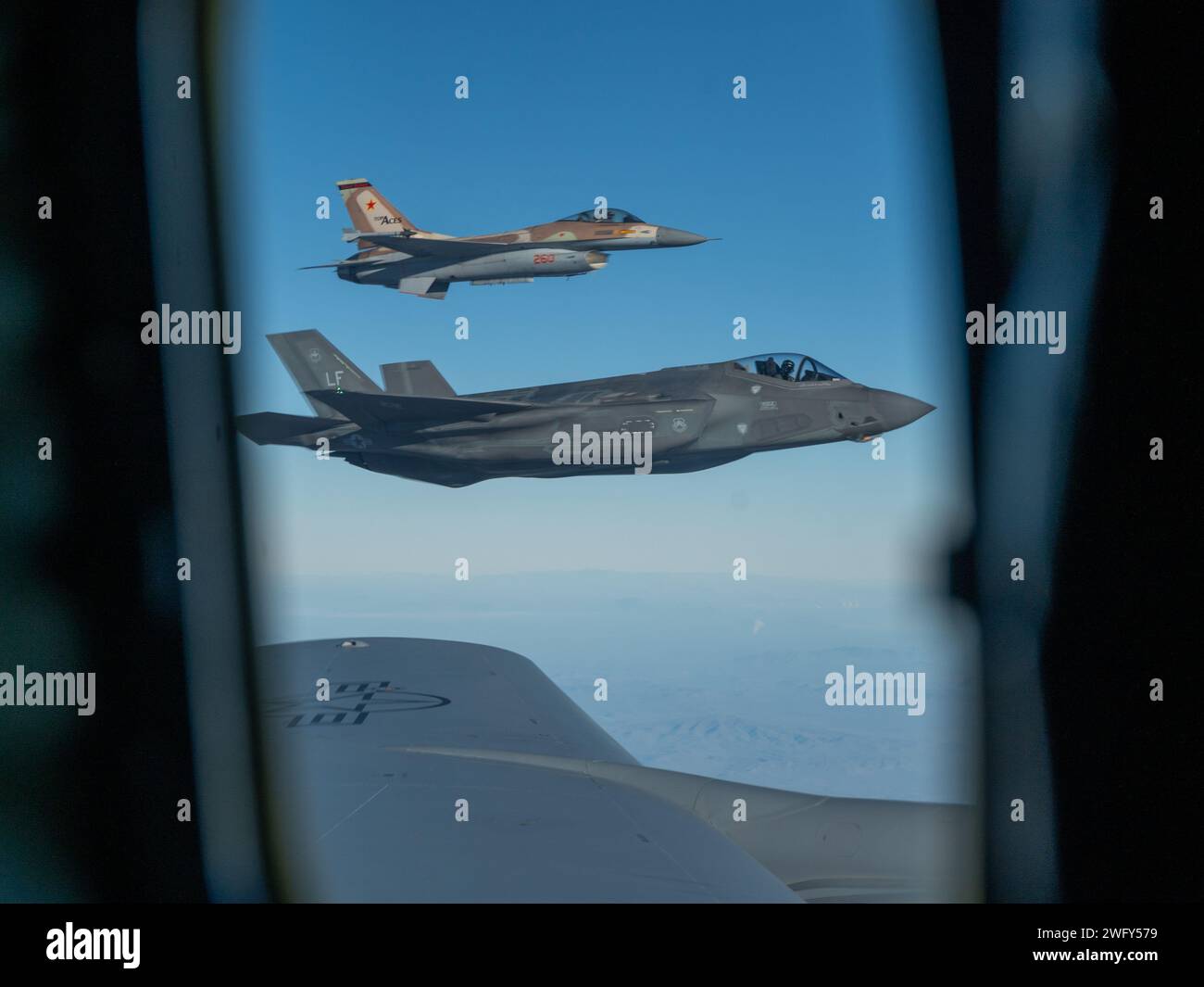 An F-35 Lightning II assigned to the 56th Fighter Wing and a Lockheed ...