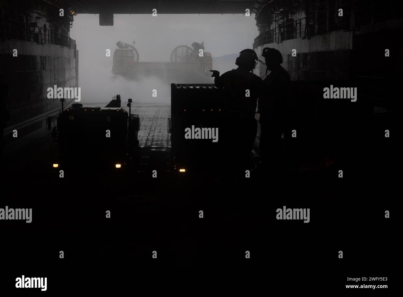 U.S. Navy Sailors with the amphibious docking ship USS Green Bay (LPD ...