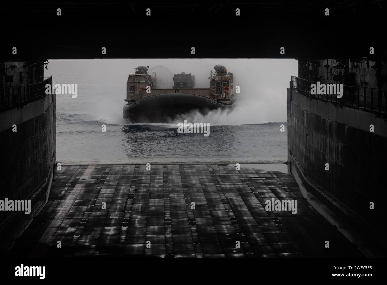 U.S. Navy Sailors with the amphibious docking ship USS Green Bay (LPD ...
