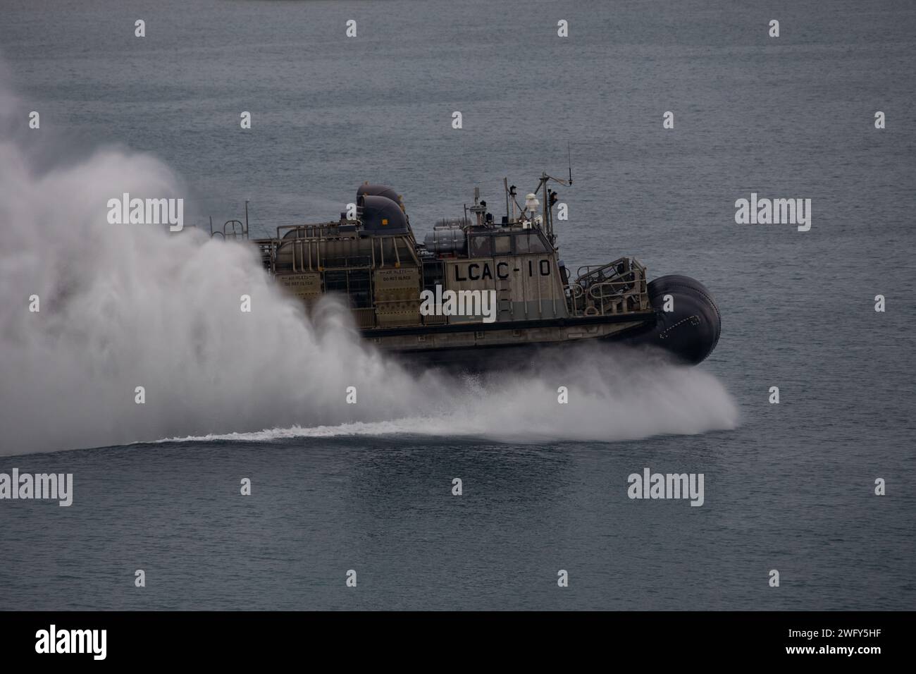 U.S. Navy Sailors with the amphibious docking ship USS Green Bay (LPD ...