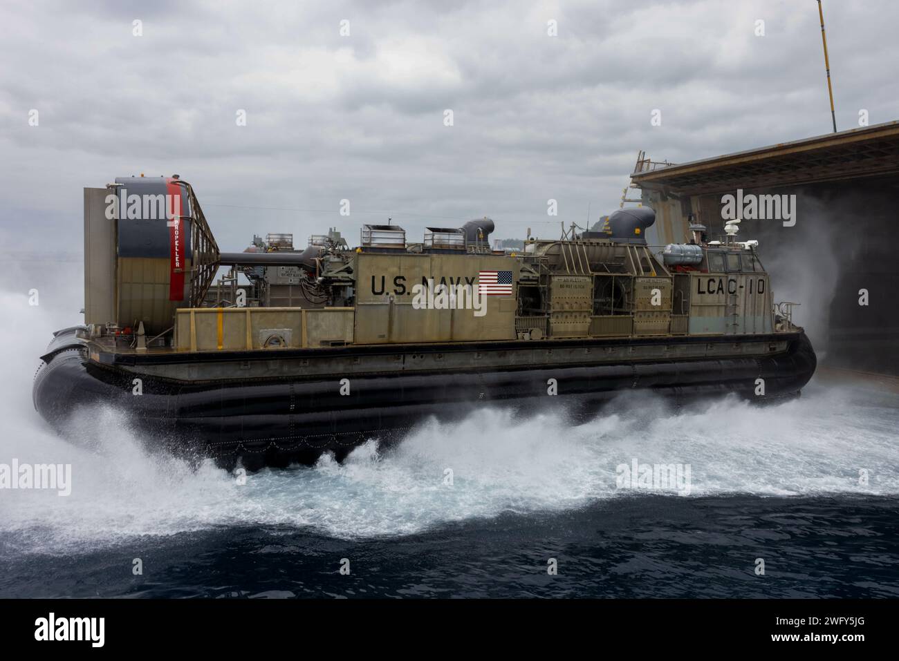 U.S. Navy Sailors with the amphibious docking ship USS Green Bay (LPD ...