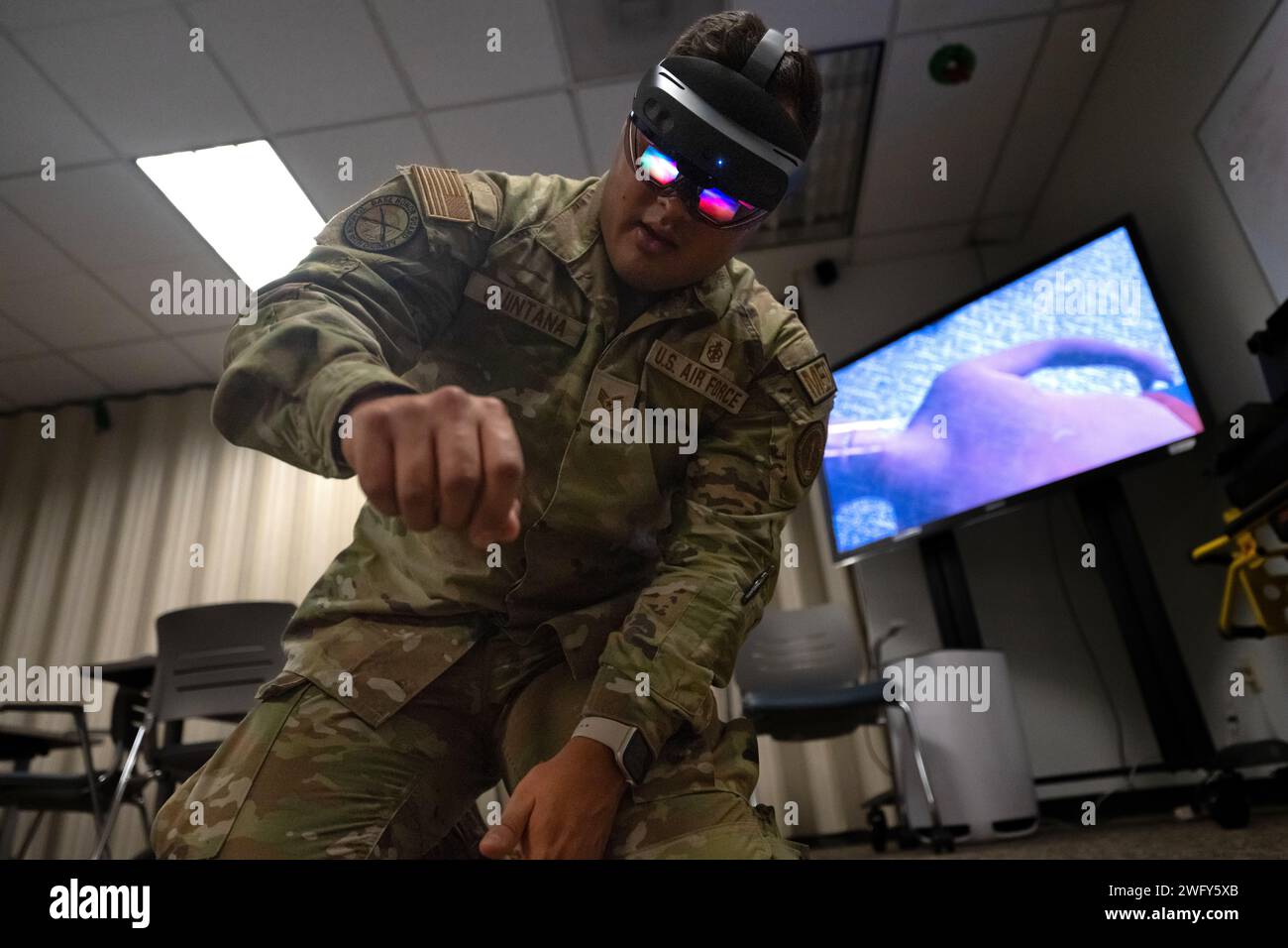 U.S. Air National Guard Staff Sgt. Jesse Quintana, an Aerospace Medical Service Specialist ...