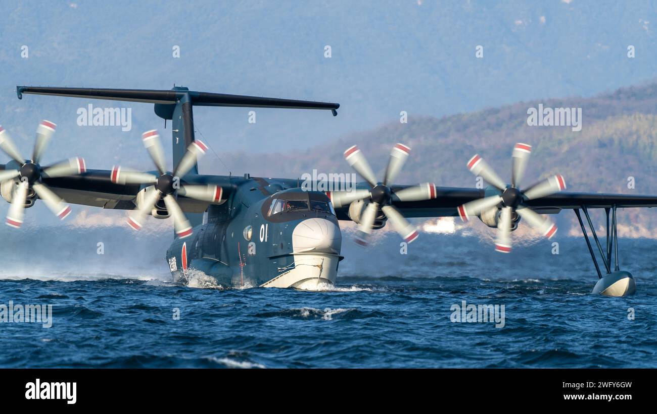 A Japan Maritime Self-Defense Force ShinMaywa US-2 prepares to take off during the JMSDF New ...