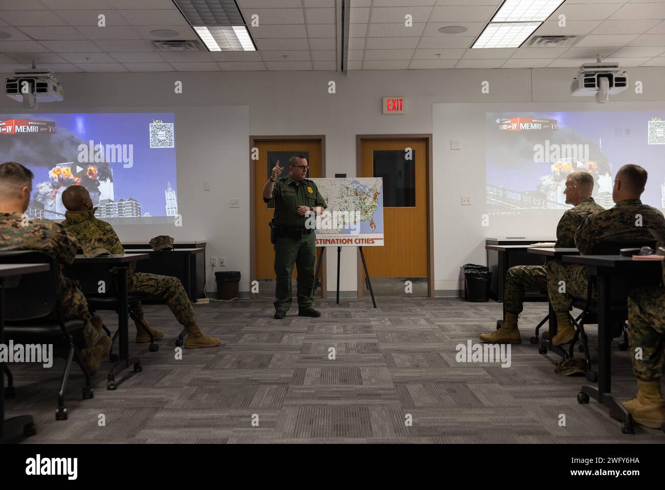 Sean McGoffin, chief border patrol agent, gives a brief to the ...