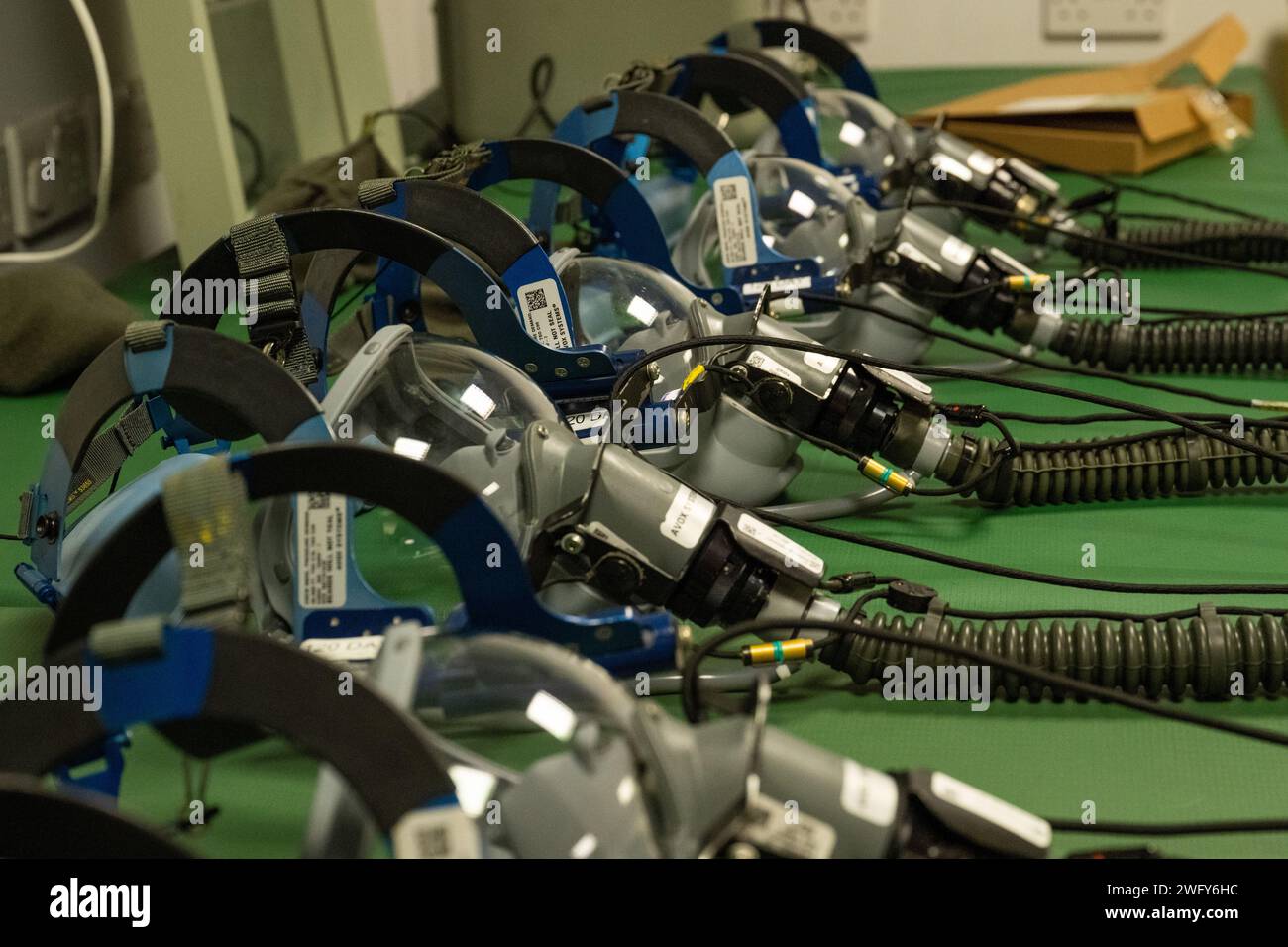Quick-don oxygen masks are placed on a table after assembly at Royal ...