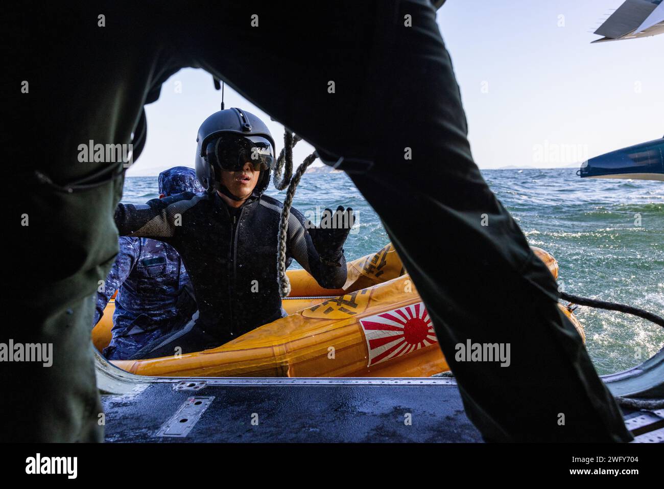 A Japan Maritime Self-Defense Force rescue swimmer with Air Rescue ...