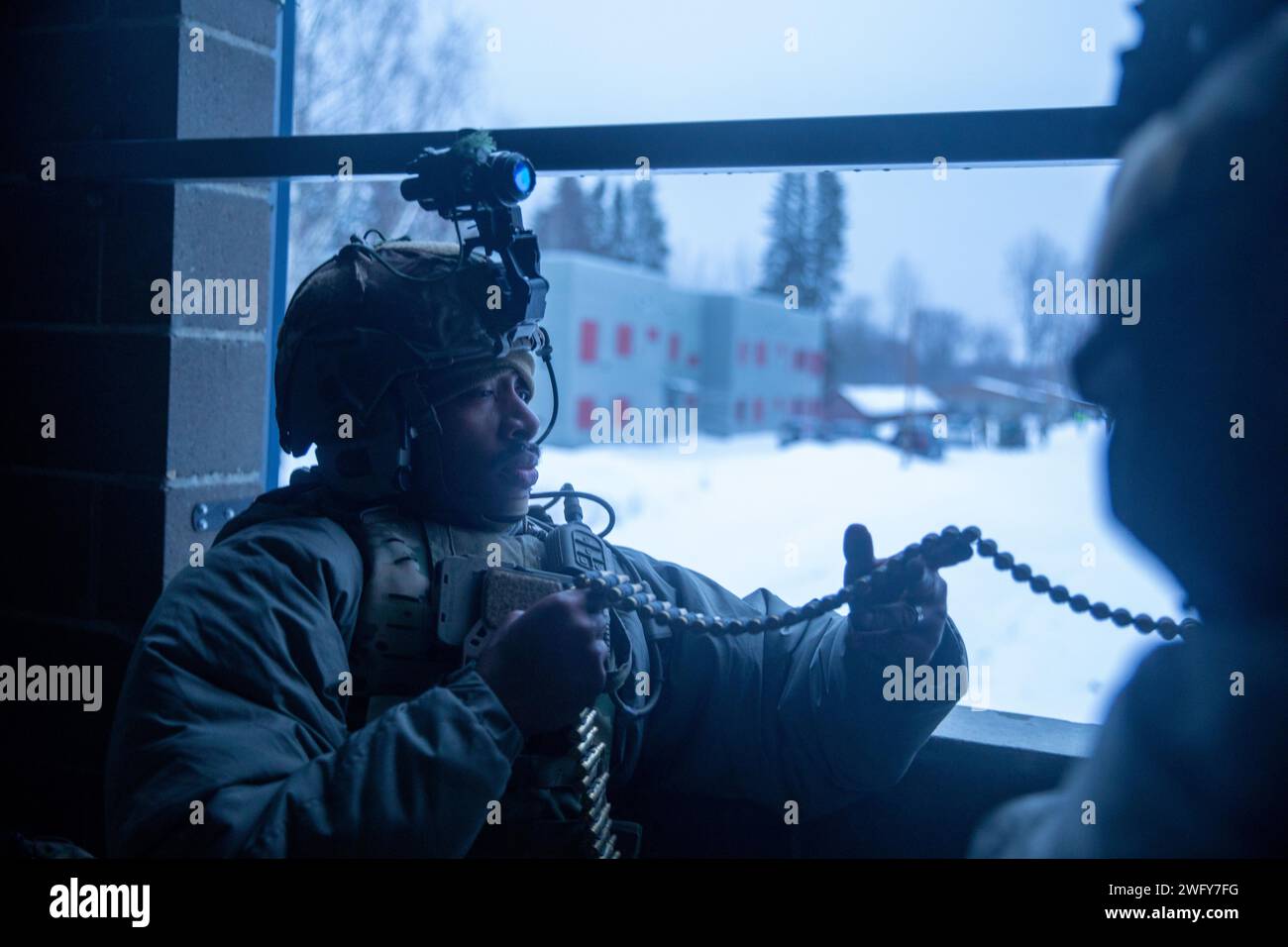 U.S. Army Soldier Spc. Juan Serrano, an assistant gunner with 1st ...