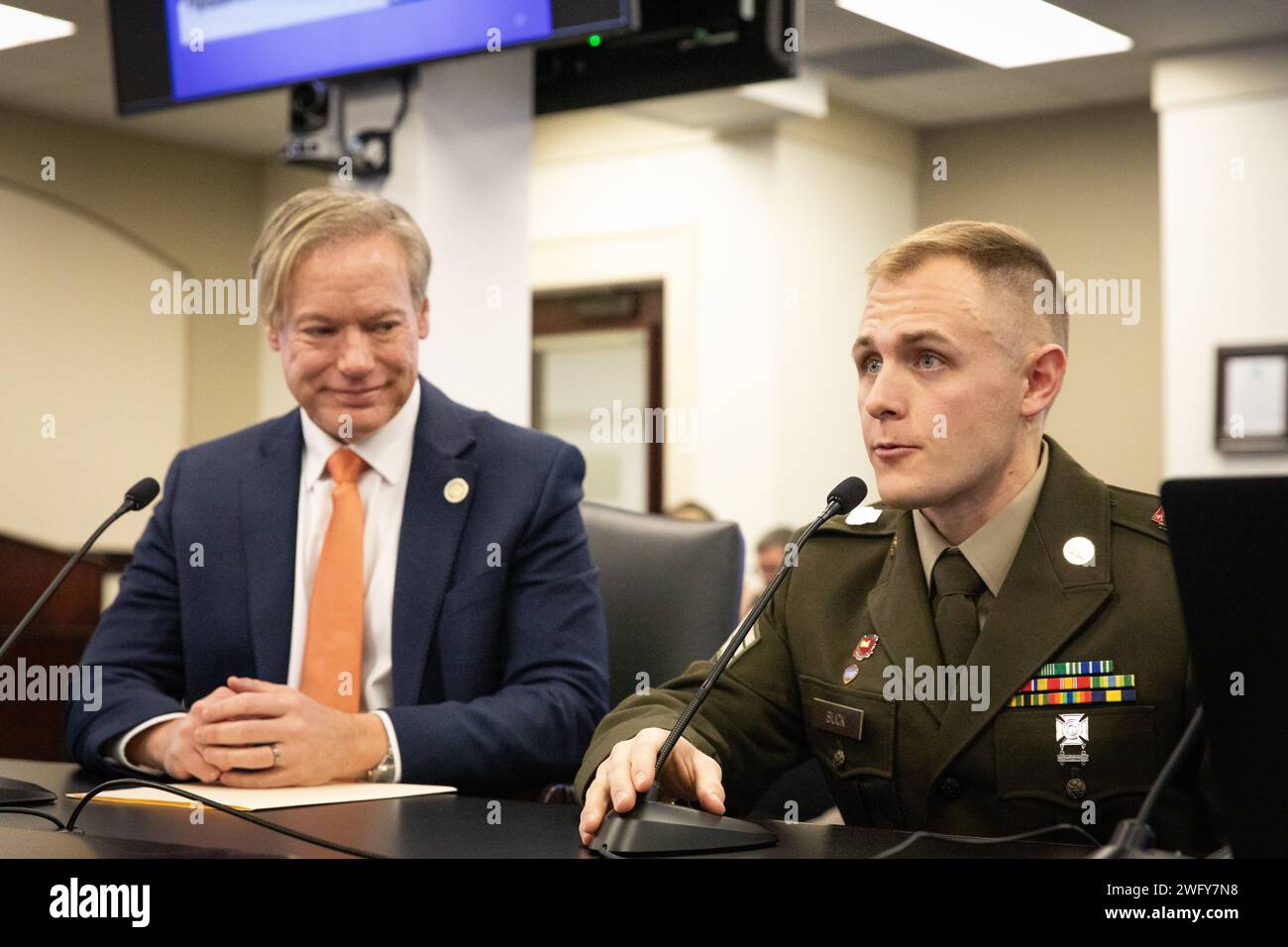 Army Sgt. Robert Buck (right) is being recognized for his ...