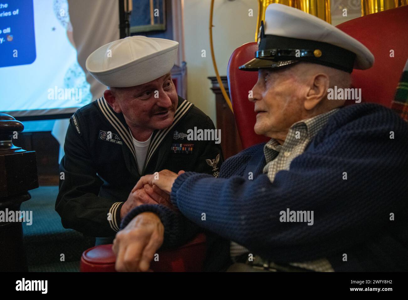 Logistics Specialist 1st Class Leroy Cook speaks with World War II ...