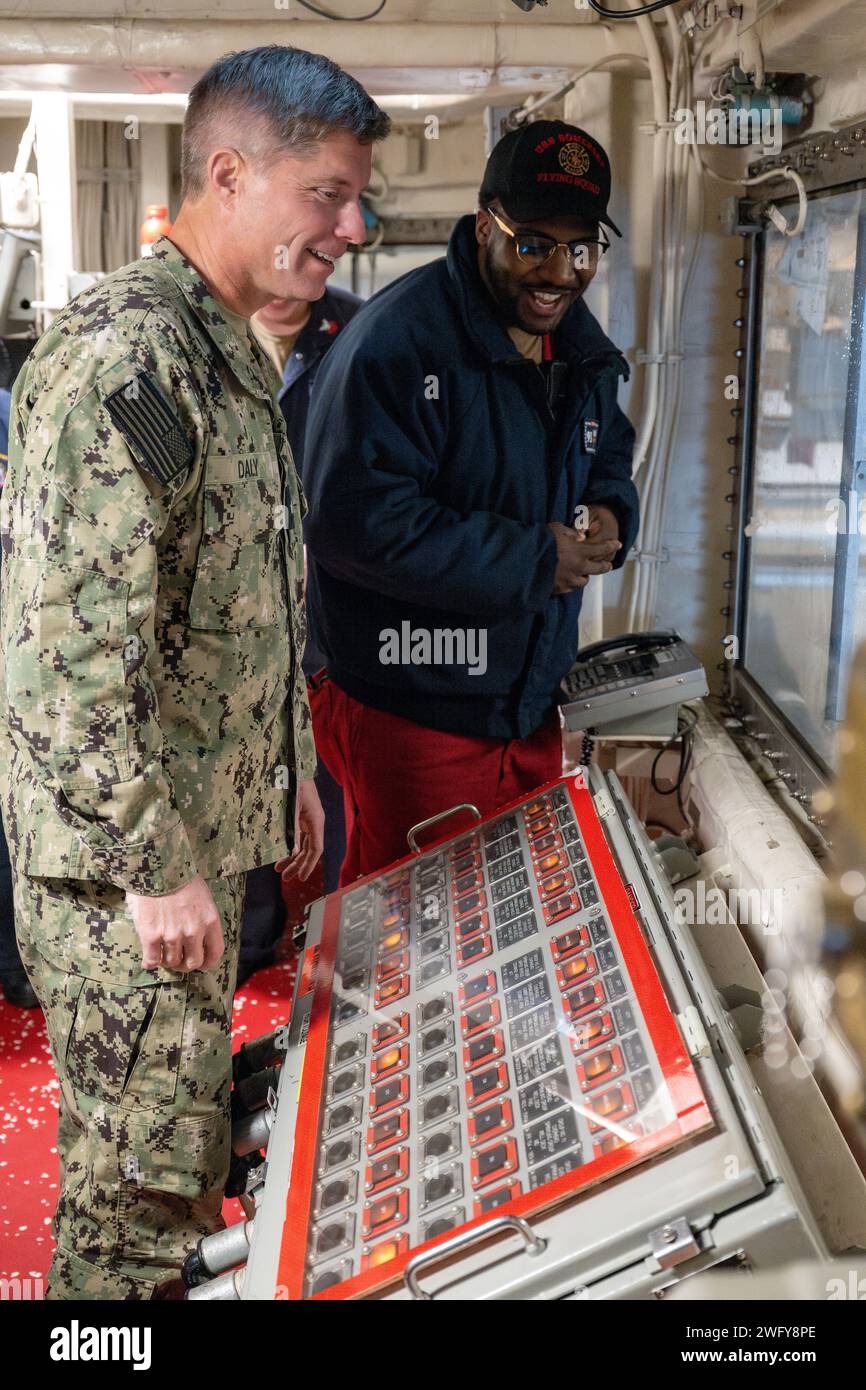Ensign Carson Best (right), damage control assistant of the San Antonio ...