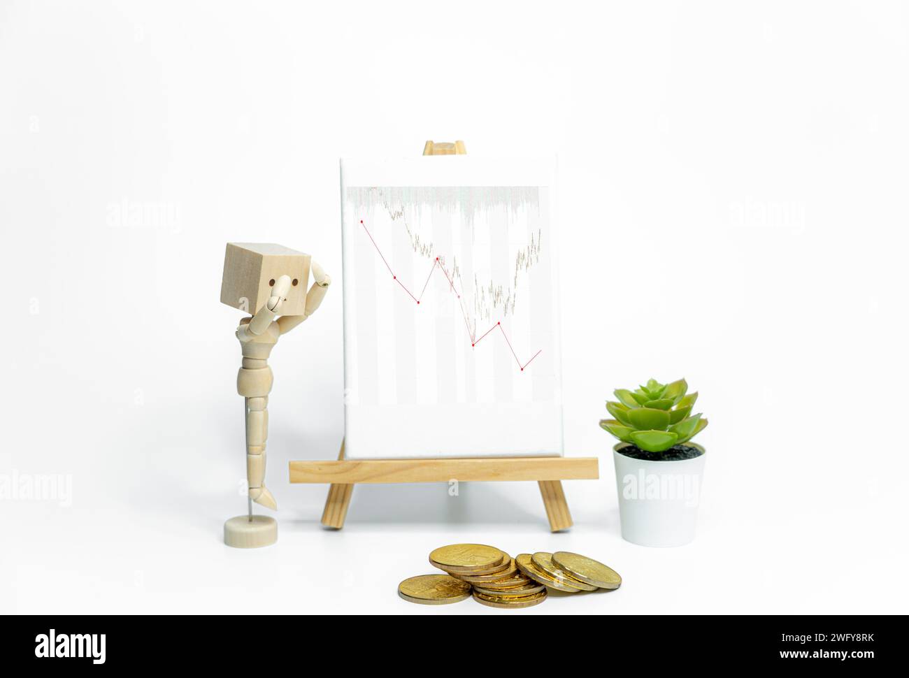 Mannequin drawing a graph charts on easel; isolated on white background ...