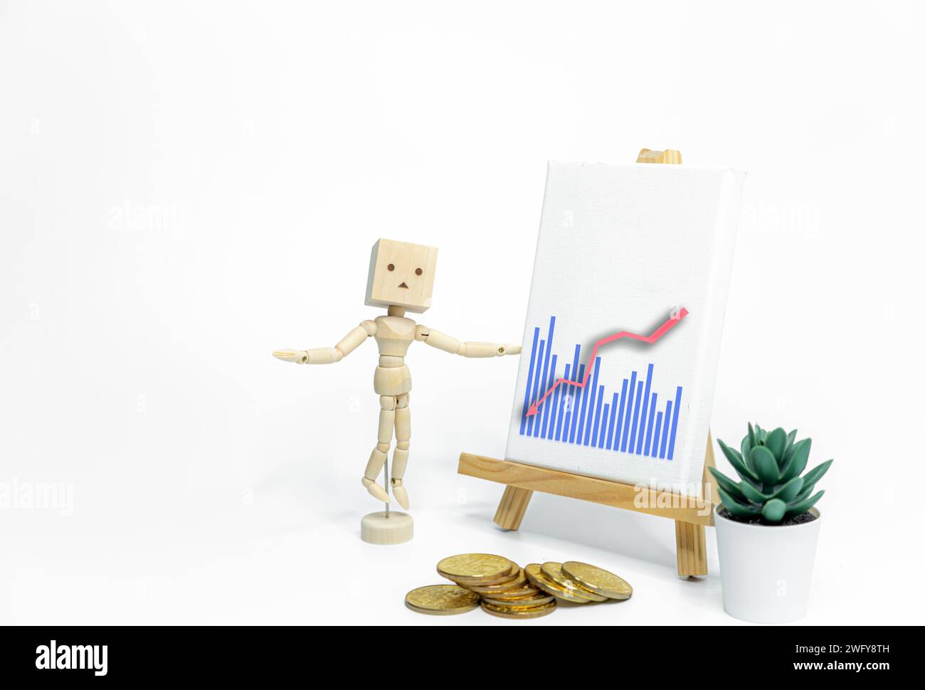 Mannequin drawing a graph charts on easel; isolated on white background ...