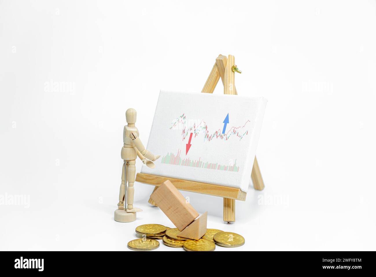 Mannequin drawing a graph charts on easel; isolated on white background ...
