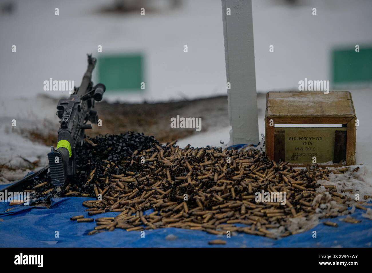 An M240 machine gun cools down between firing sessions during a heavy ...
