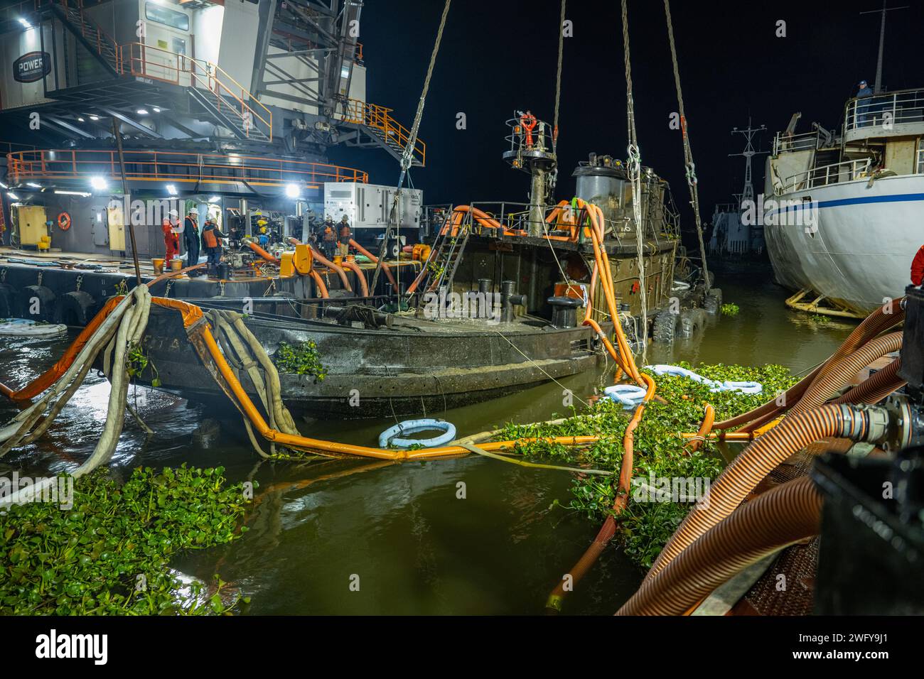 The tug Mazapeta, a 1940s era military tugboat, is raised from the ...