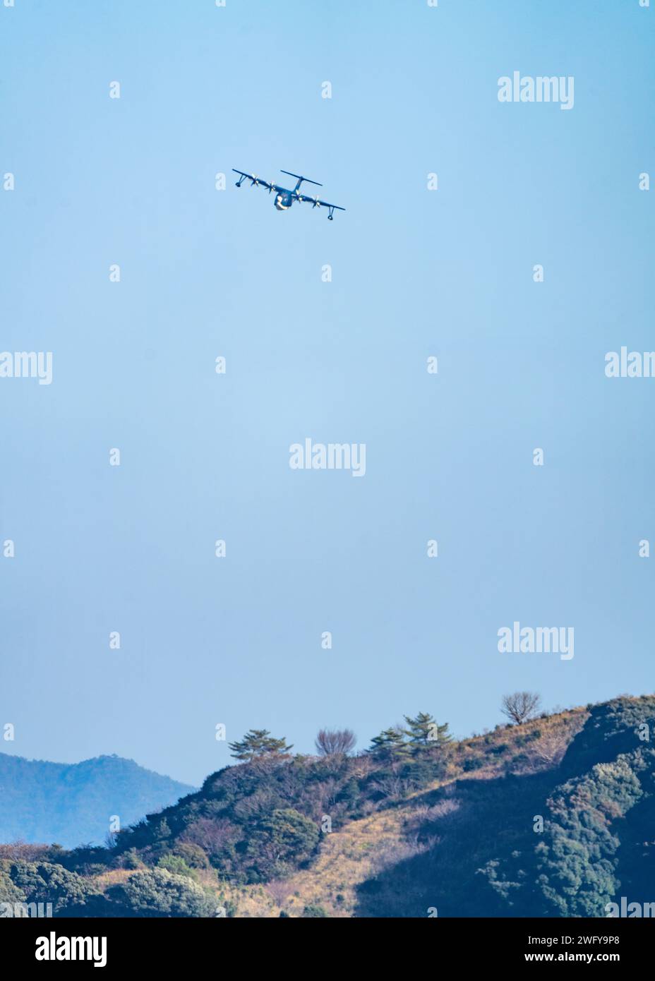 A Japan Maritime Self-Defense Force ShinMaywa US-2 flies above ...