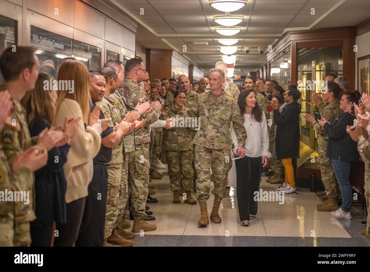 U.S. Soldiers and senior leaders participate in a clap-out ceremony in ...