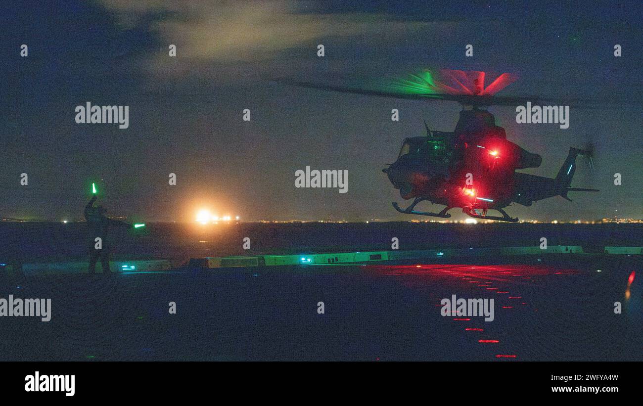 Aviation Boatswain’s Mate (Handling) 3rd Class Michael Aguilar, a ...