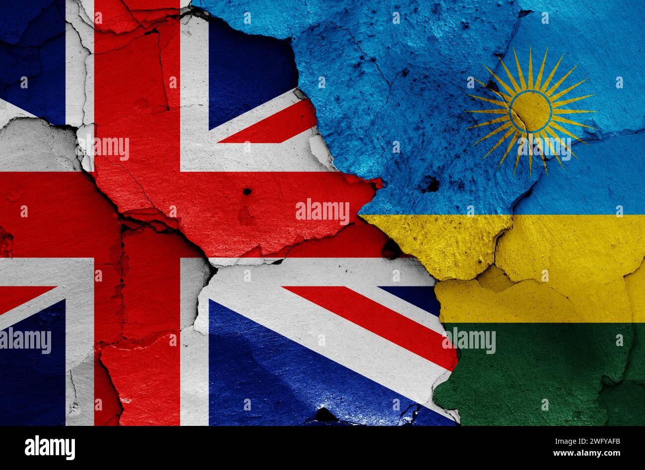 flags of UK and Rwanda painted on cracked wall Stock Photo - Alamy