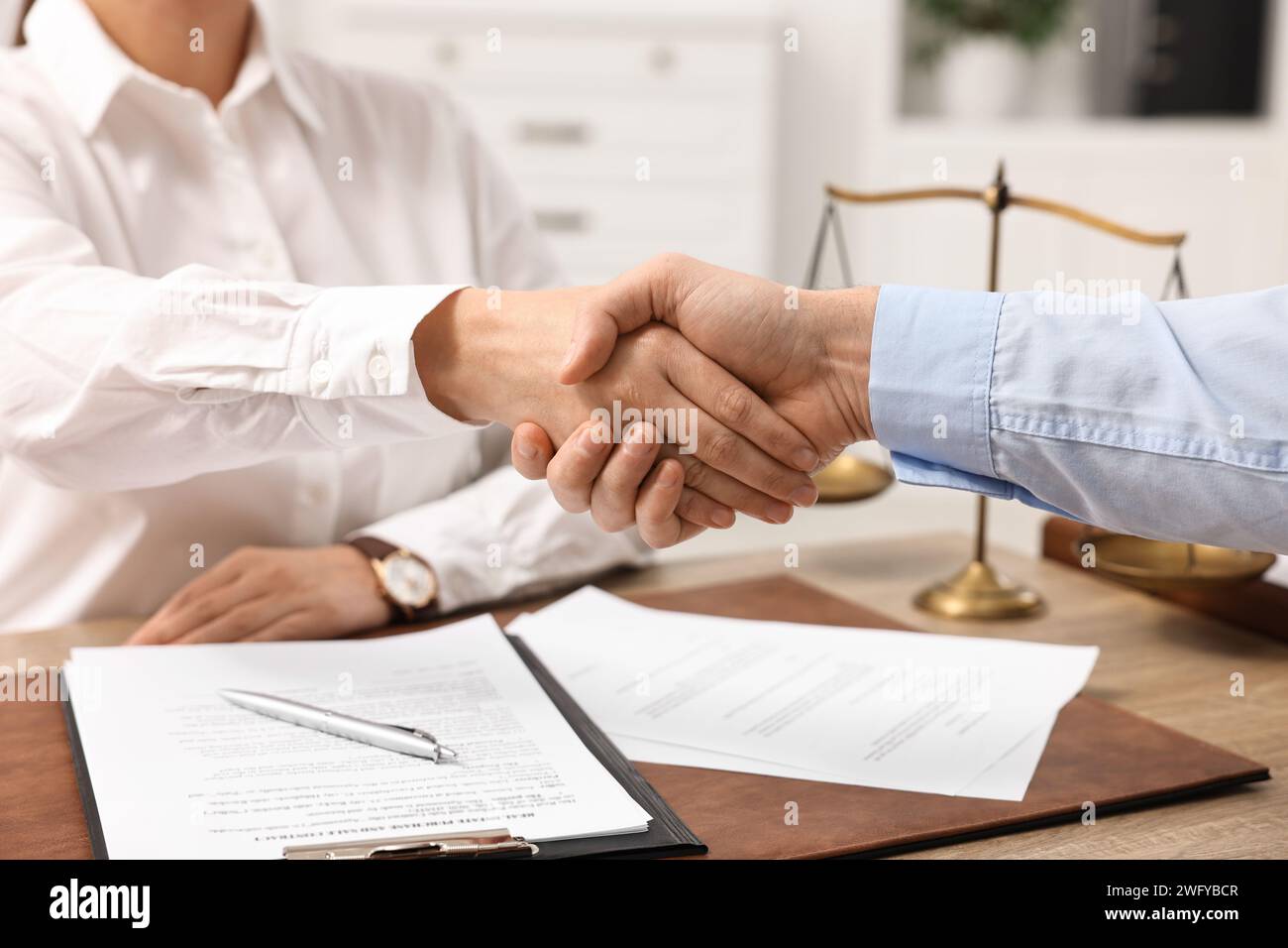 Judge lawyer shaking hands in hi-res stock photography and images - Alamy