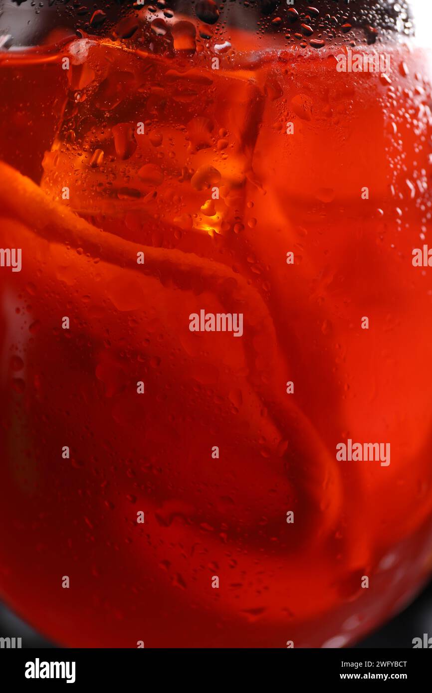 Tasty Aperol spritz cocktail with ice cubes in glass, closeup Stock ...