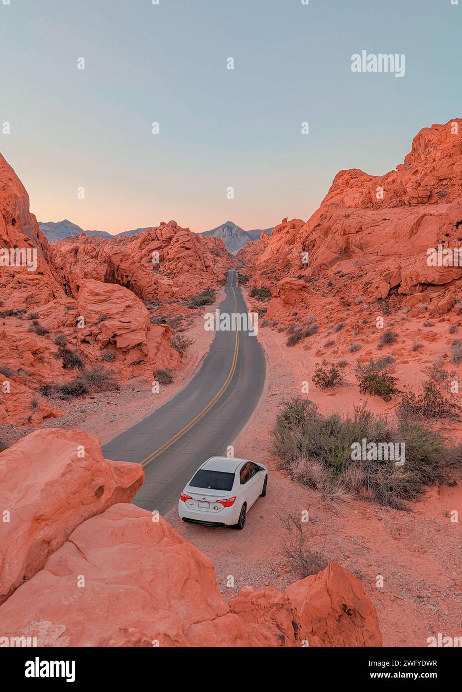 Mouse's Tank Road with white car in Valley of Fire State Park, Nevada ...