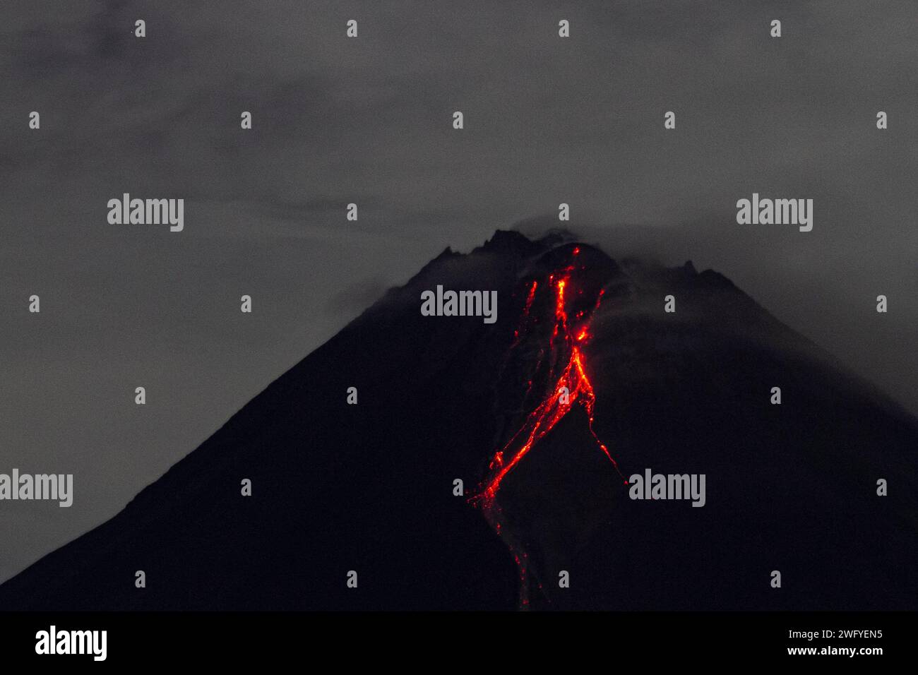 Magelang, Central Java, Indonesia. 1st Feb, 2024. Mount Merapi spews volcanic material, seen ...
