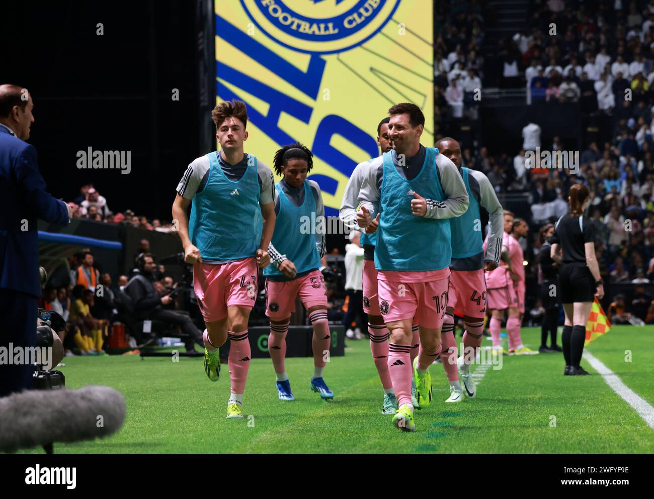 Riyadh, Saudi Arabia. 1st Feb, 2024. Inter Miami's Lionel Messi (R ...