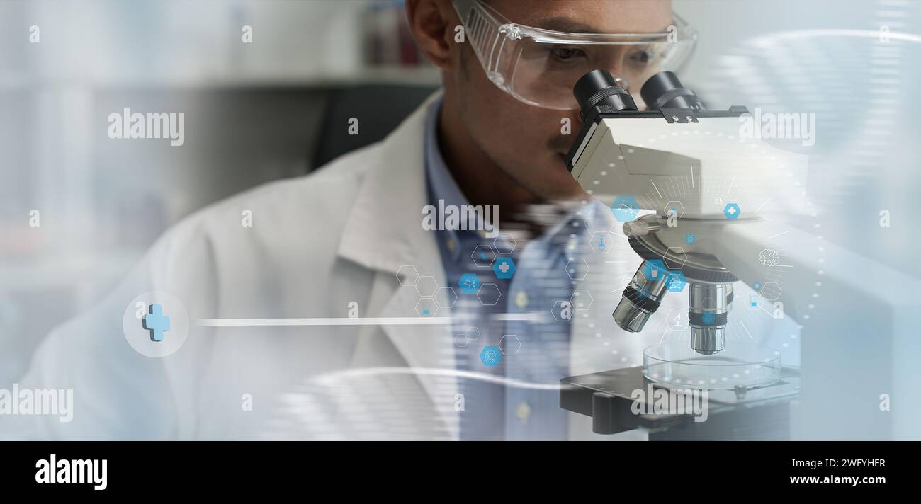 Scientist conducting research in a laboratory, utilizing tubes and ...
